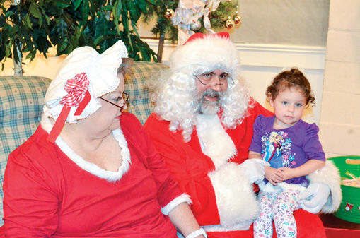 Ready for Christmas: Rain can’t stop Santa, Mrs. Claus from coming to town