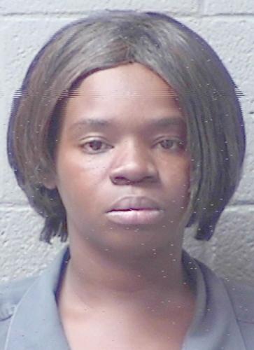 Woman charged with grand larceny