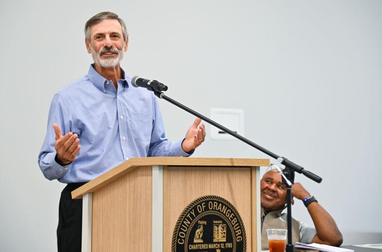 O'Cain speaks to crowd about former coach Dick Sheridan