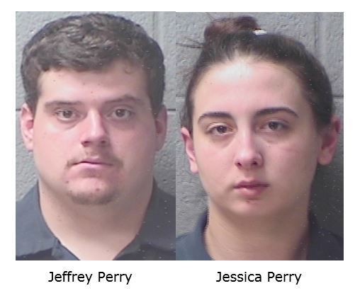 Two charged in North armed robbery