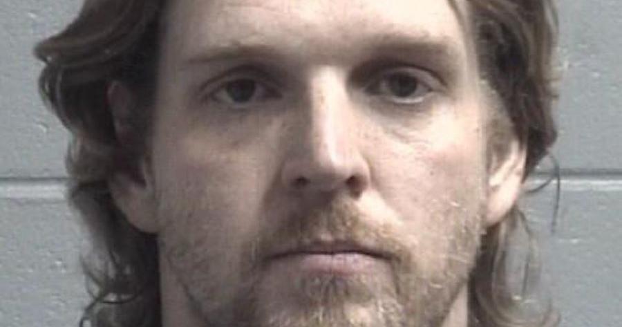Vance man faces new charge; suspect accused of pointing rifle at vehicle