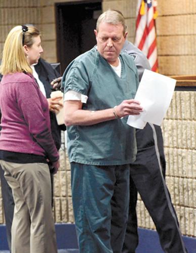 Ex-coroner, woman accused of stealing from funeral home