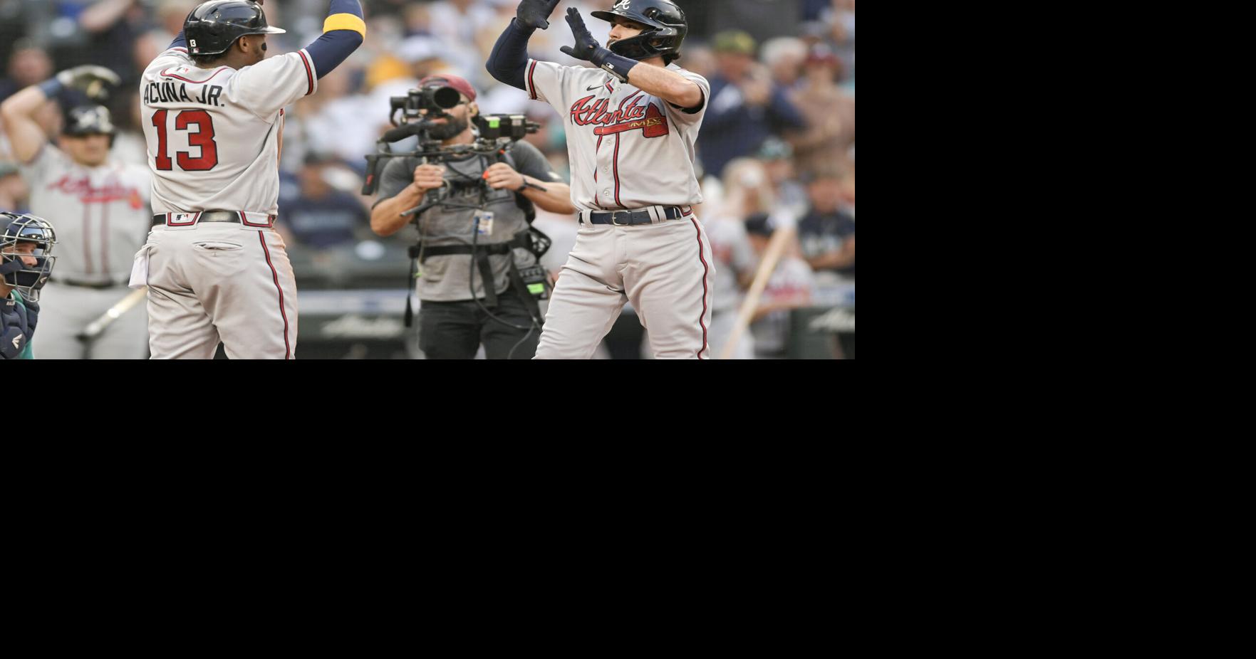 IN PHOTOS: Braves beat Mariners, alone in 1st for first time all year