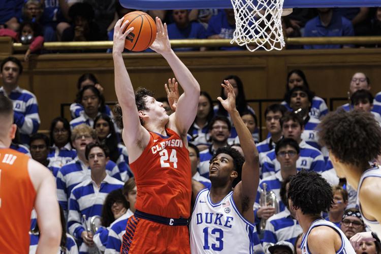 Late free throws help No. 12 Duke hold off Tigers 72-71