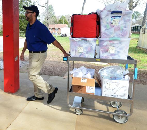 PHOTOS: ABSS grab and go lunches prepared for delivery to students ...