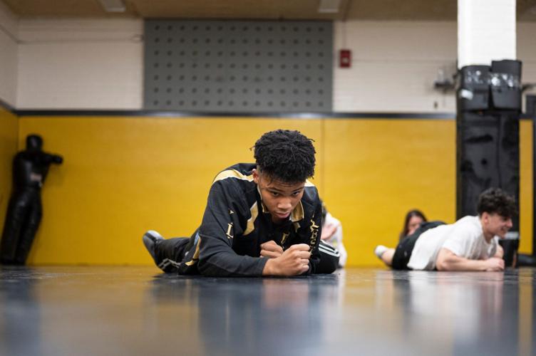 Jordan McDowell, a Williams High wrestler who was born deaf, brings ...