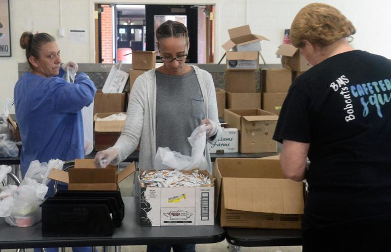 PHOTOS: ABSS grab and go lunches prepared for delivery to students ...