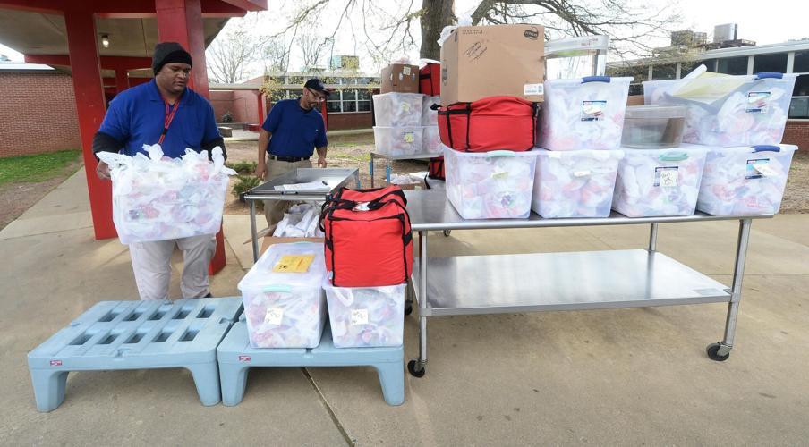 PHOTOS: ABSS grab and go lunches prepared for delivery to students ...