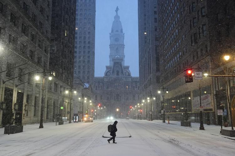 Massive winter storm dumps sleet, freezing rain and snow around much of ...