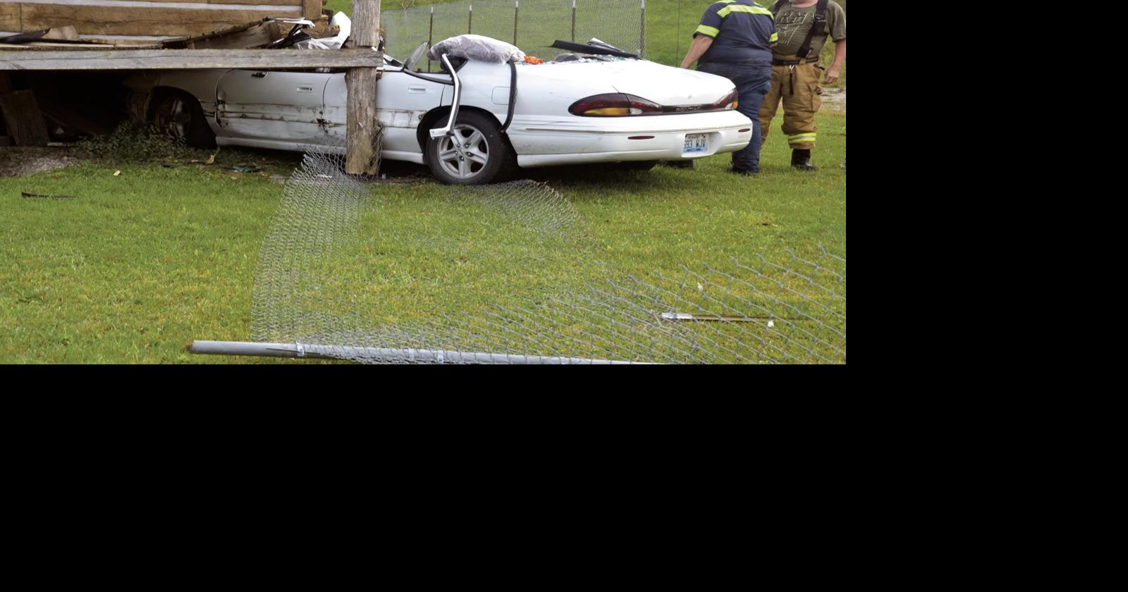 Car hits building after crash with another vehicle | News ...