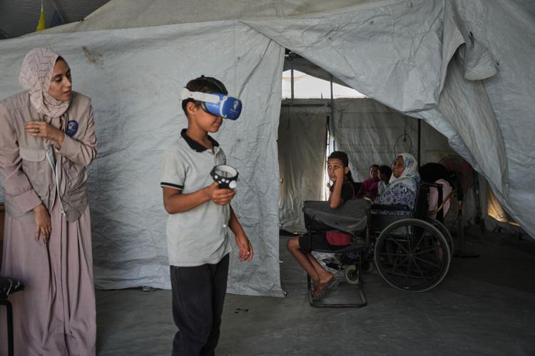 Photos of virtual reality sessions offering psychological support in ...