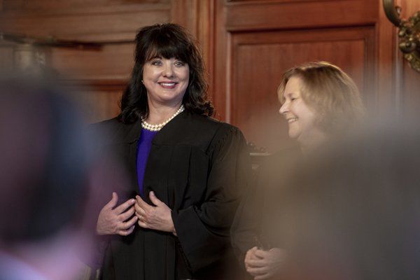 Lambert formally sworn in as Supreme Court justice | Community ...