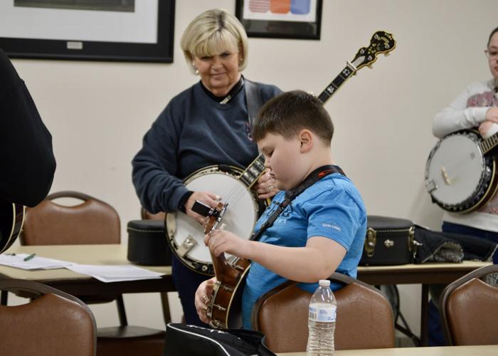 Beginner and advanced musicians come together for 'Pickin' for Kids ...