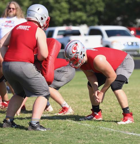 FOOTBALL IS IN THE AIR: The Corbin Redhounds held their first practice ...