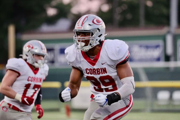 Redhounds take care of business during 30-10 rout of Lexington Catholic ...