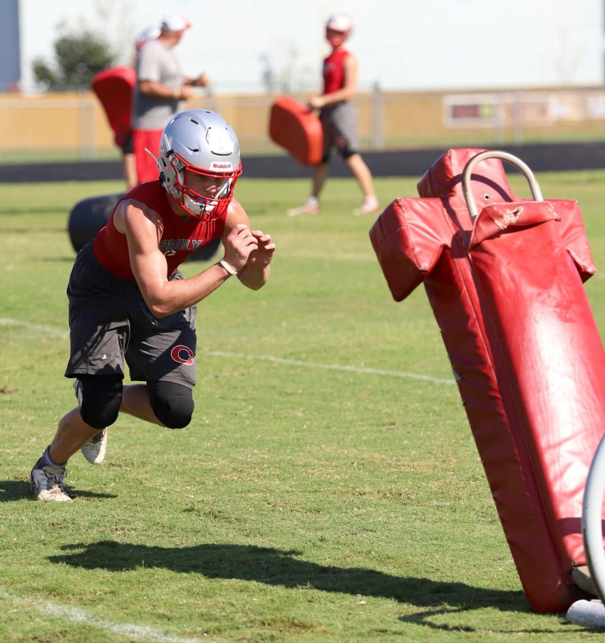 FOOTBALL IS IN THE AIR: The Corbin Redhounds held their first practice ...