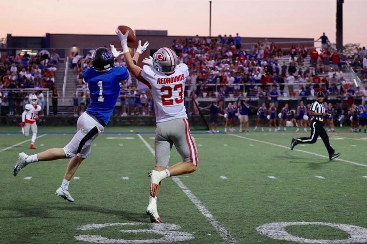 Redhounds take care of business during 30-10 rout of Lexington Catholic ...