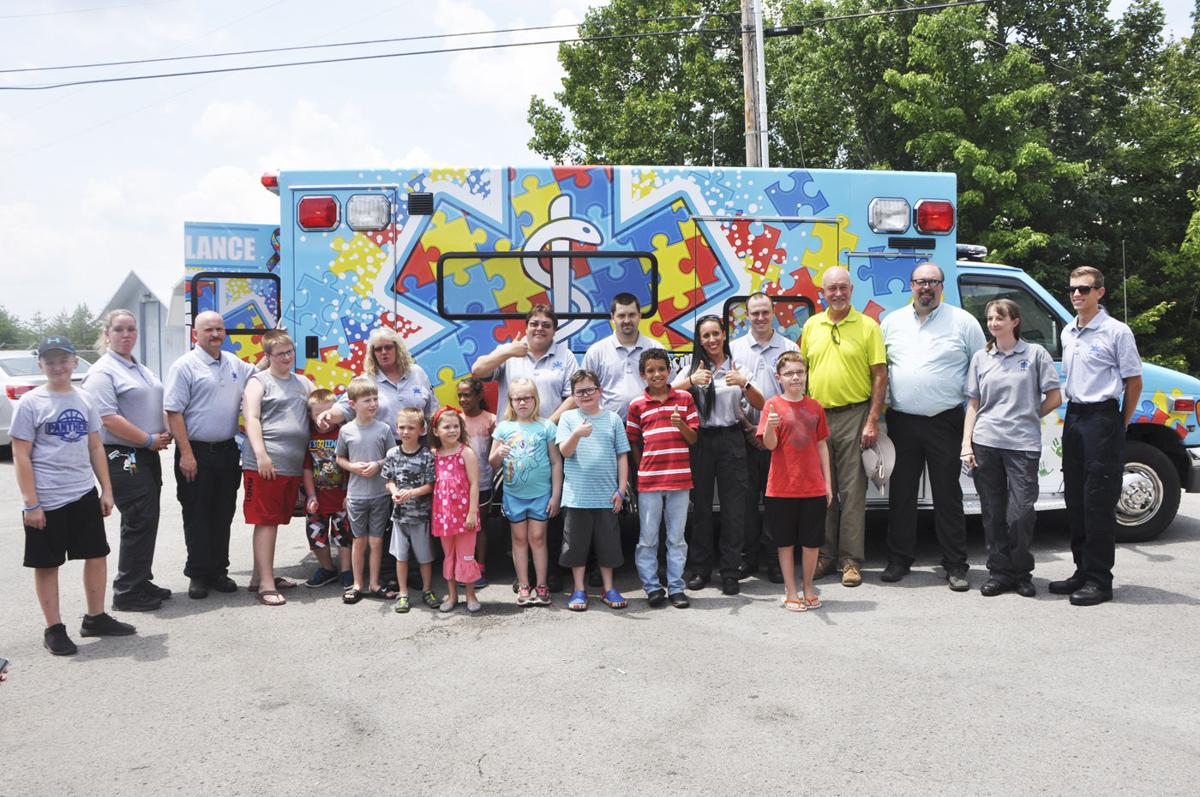 Ambulance wrapped in handprints of autistic children unveiled Thursday ...