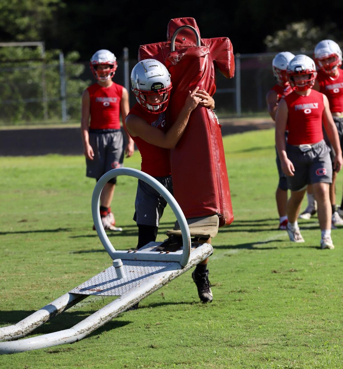 FOOTBALL IS IN THE AIR: The Corbin Redhounds held their first practice ...