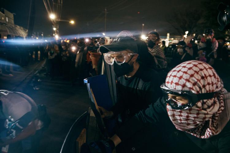 Protesters clash with law enforcement outside a New Jersey detention ...