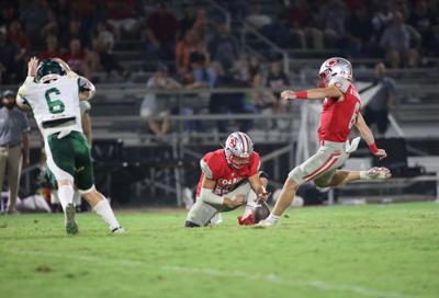 TAKING CARE OF BUSINESS: Corbin wins season-opener, Baker kicks school ...