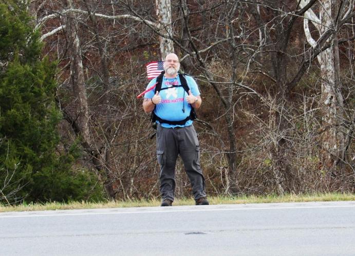 Man walks from Corbin to Barbourville for veteran suicide awareness ...