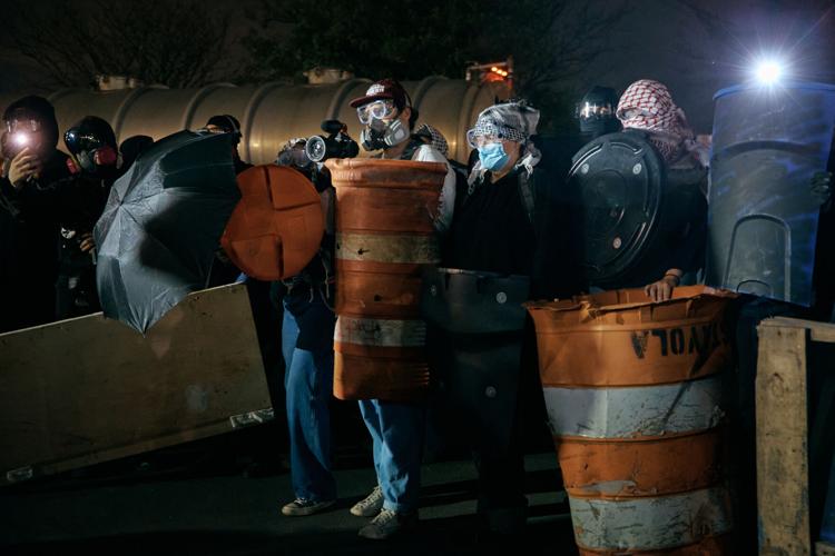 Photos show protestors and ICE agents clashing outside a New Jersey ...