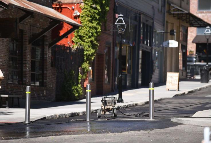 Softscape elements on historical street prove to be controversial ...