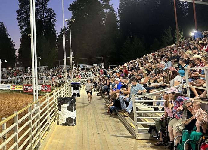 Mutton bustin' champion and bull and bronc riding at the county fair ...