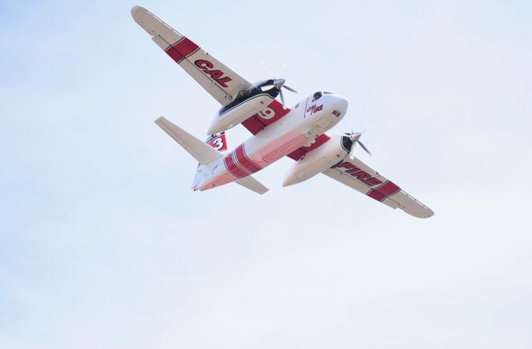 McCourtney vegetation fire threatens structures before firefighters ...