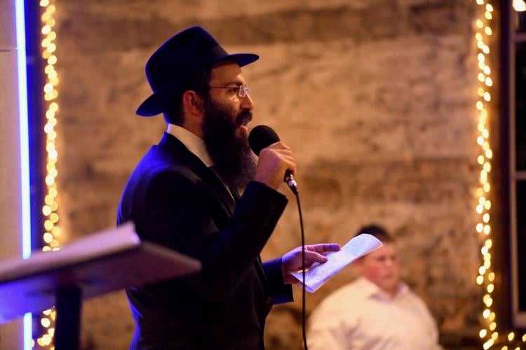 Annual menorah lighting ceremony brought inside due to rain (PHOTO ...