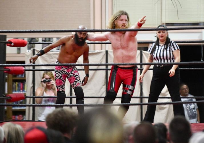 'Slam in the Stacks' wrestling packs Madelyn Helling library ...