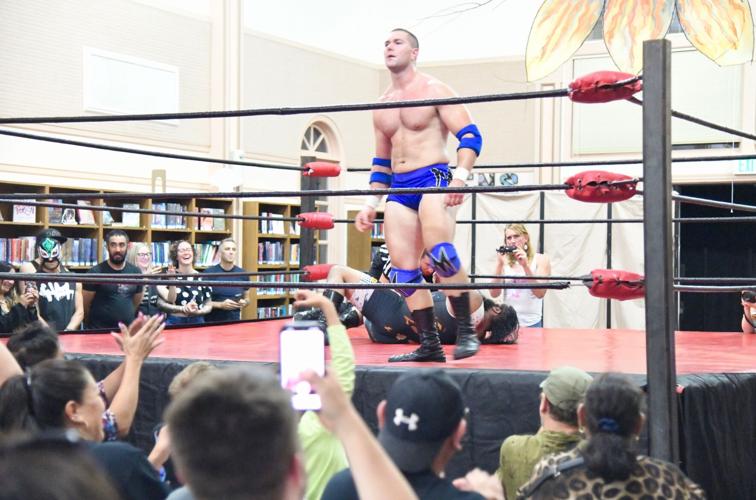 'Slam in the Stacks' wrestling packs Madelyn Helling library ...