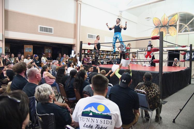 'Slam in the Stacks' wrestling packs Madelyn Helling library ...