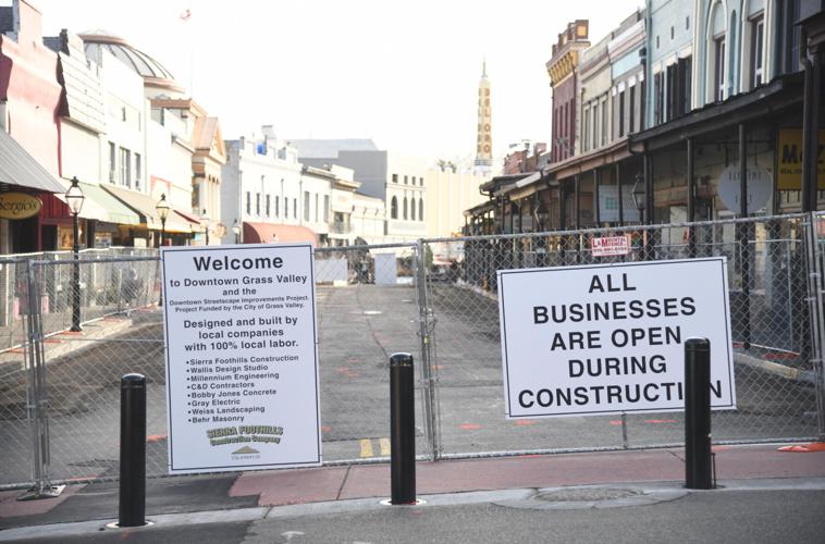 Fencing goes up: Mill Street transformation continues | Multimedia ...
