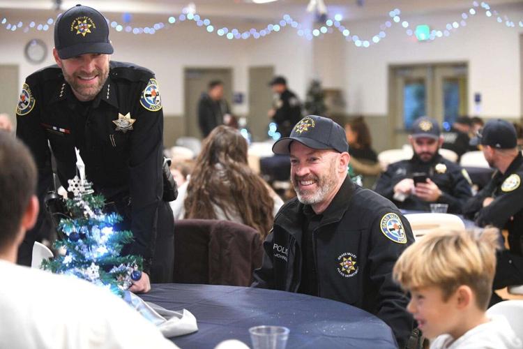 Sharing and caring: Grass Valley Police Department hosts holiday gift ...