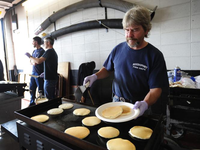 Firefighters serve up pancakes to raise money for firehouse | Photo ...