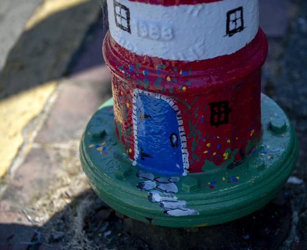 Colorful, ocean-inspired fire hydrants painted for beautification ...