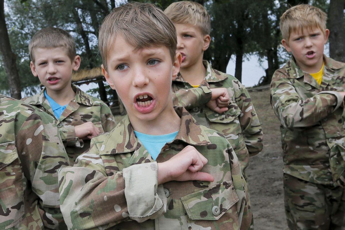 Photos: Children in war-torn Ukraine learn the art of war ...