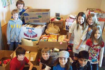Students fill the food bank with a ton of items | News ...