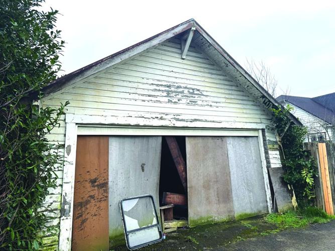 Contractors volunteer to remove problem garage | News ...