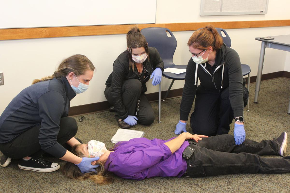 Emergency Medical students practice skills through simulation scenarios ...