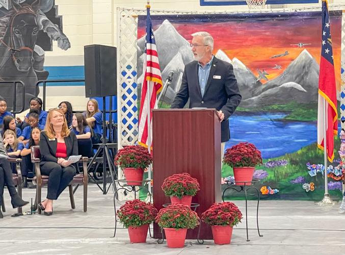 Retired colonel shares message of sacrifice and service at Veterans Day ...