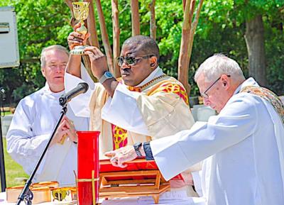 80 years of history: St. George Catholic Church gathers at cemetery ...