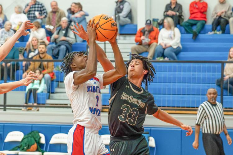 Heritage Hawks soar on Senior Night with sweeping victories over Holy ...