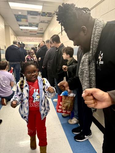 Newnan Crossing students get a helping hand at Fist Bump Friday | News ...