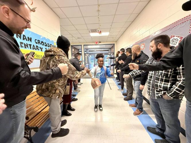 Newnan Crossing students get a helping hand at Fist Bump Friday | News ...