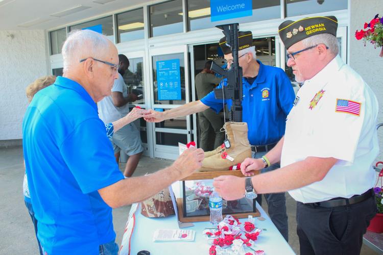 VFW raises money for relief fund with annual poppy drive | News | times ...