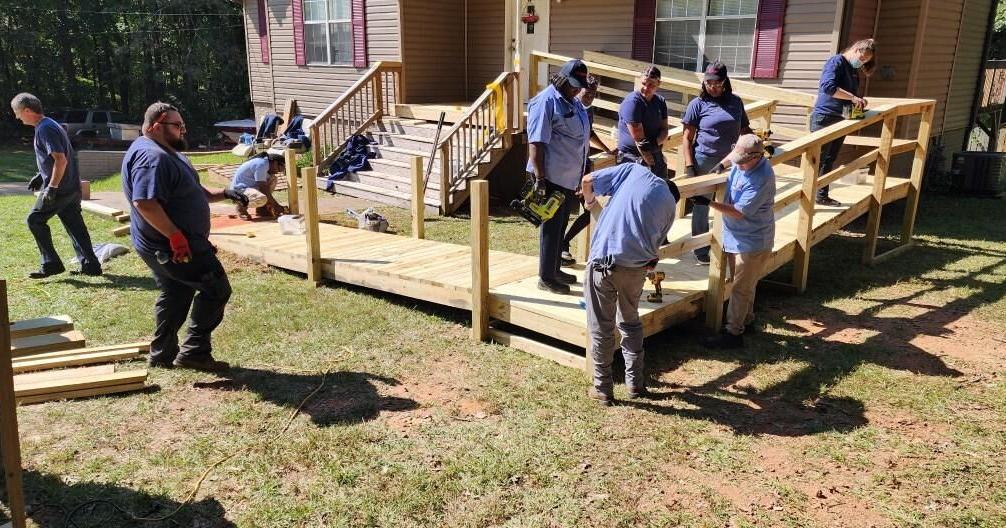 Yamaha employees build wheelchair ramp during production downtime ...