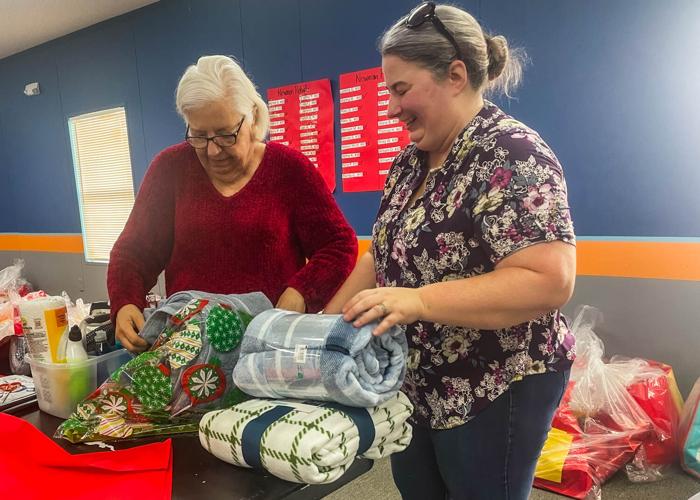 Silver Bells volunteers prepare to deliver gifts to seniors | Arts ...